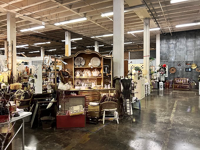 Industrial chic meets vintage charm as original mill columns frame endless aisles of curated collections. Every corner tells a different story.