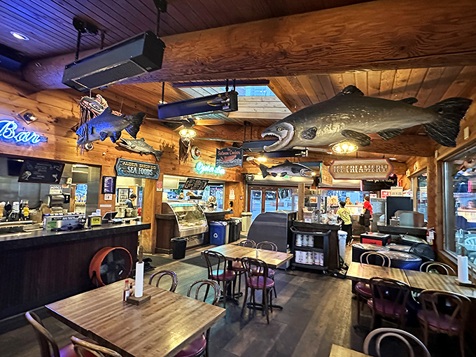 Taxidermied fish keep watchful eyes on diners from wooden walls, creating the perfect "I caught this big" atmosphere without requiring any actual fishing skills.