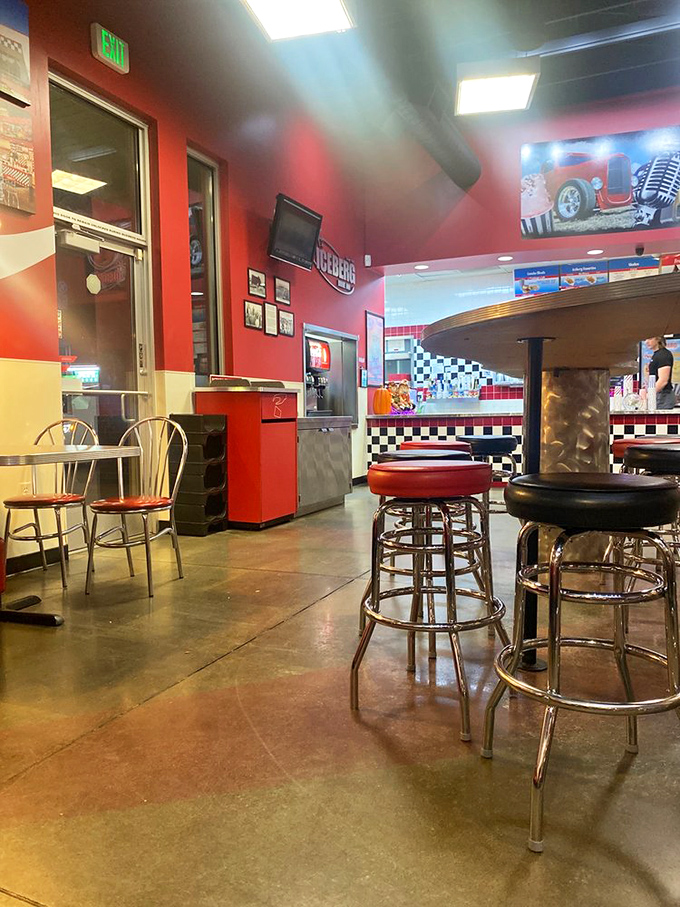 Step inside and the retro charm continues with classic diner seating, racing-inspired decor, and the promise of thick shakes just beyond the counter.