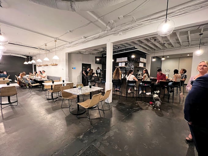 Industrial-chic meets cozy gathering spot in this thoughtfully designed taproom where strangers become friends over shared flights and common thirsts.