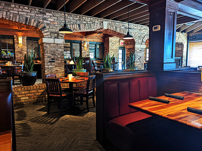 Exposed brick walls and warm wooden beams create the perfect backdrop for life's important questions: "Medium-rare or medium?"