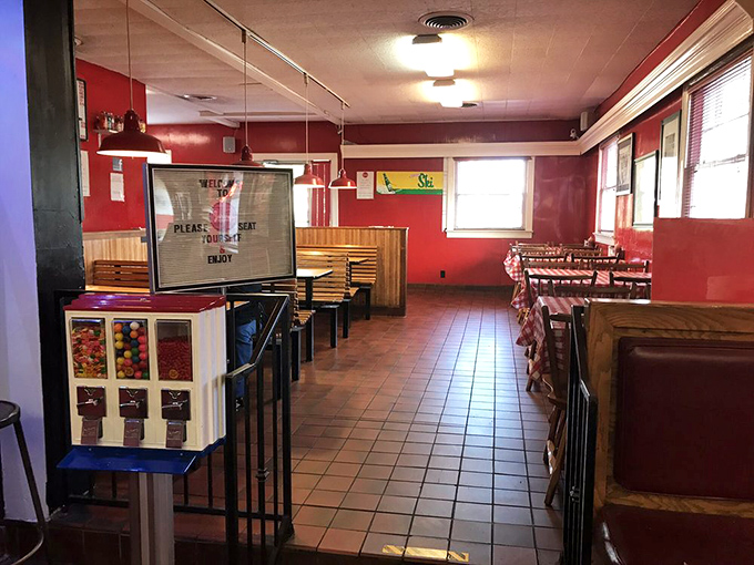 Step inside and travel back in time. The red walls and wooden booths aren't trying to impress anyone&mdash;they're too busy creating the perfect backdrop for burger bliss.