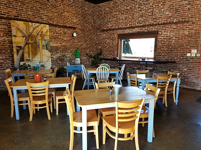 Cozy wooden tables and exposed brick create that perfect "stay awhile" atmosphere where calories consumed while sitting somehow don't count.