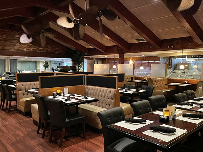 Old-school elegance meets comfortable dining. Those ceiling fans have witnessed more anniversary celebrations and business deals than a courthouse notary.