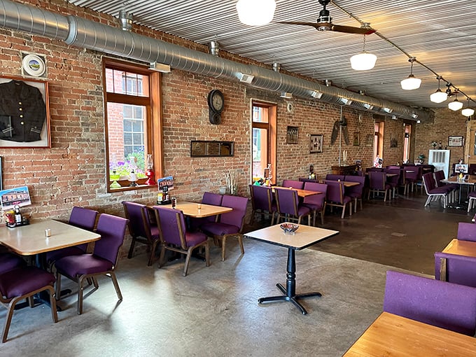 Exposed brick walls and purple chairs create the perfect balance of rustic elegance and comfort. Like that first date outfit&mdash;dressy enough for special occasions, relaxed enough to actually enjoy yourself.