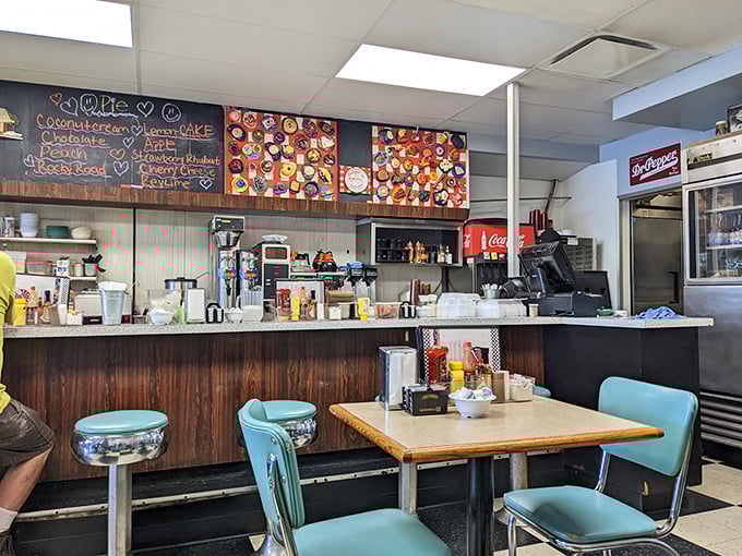 Classic turquoise vinyl meets worn wooden counters in this time capsule where coffee is always hot and conversation flows freely.