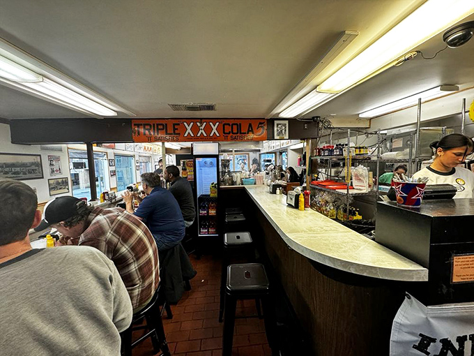 Counter seating puts you front-row for the culinary theater, where decades of short-order expertise unfold before your hungry eyes.