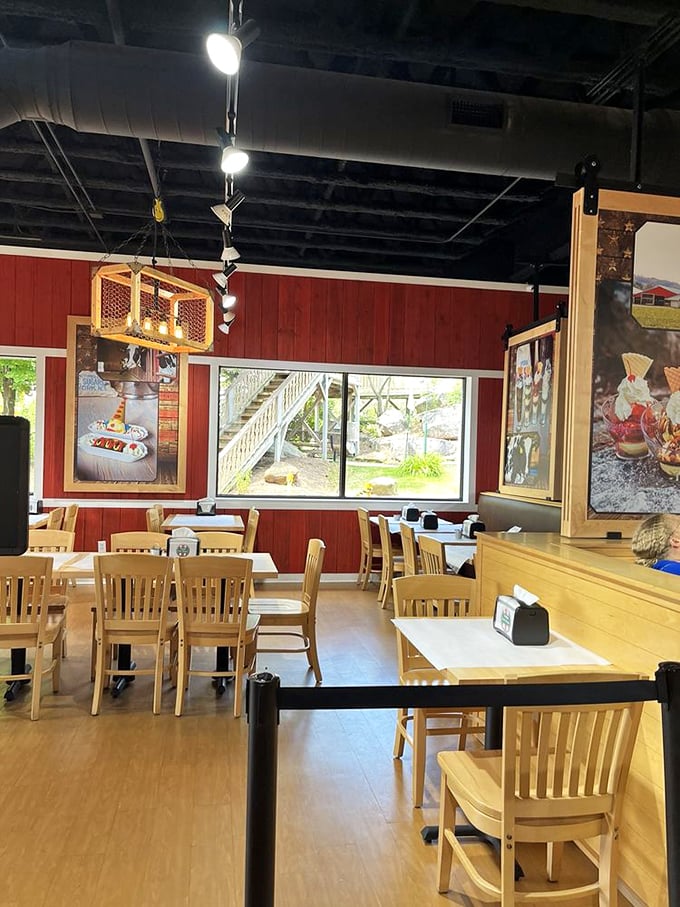 Warm wooden tones and comfortable seating create a nostalgic diner feel. This isn't just shopping—it's a full sensory candy experience.