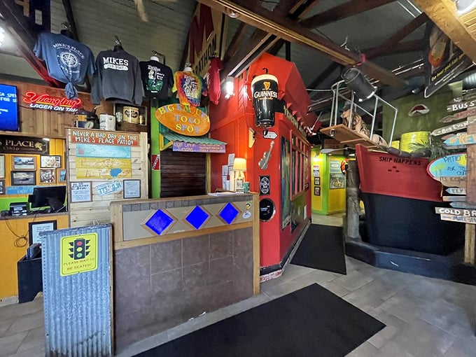 Walking into Mike's Place feels like stumbling into a theme park designed by someone who couldn't decide on a theme. The result? Gloriously organized chaos that somehow works.