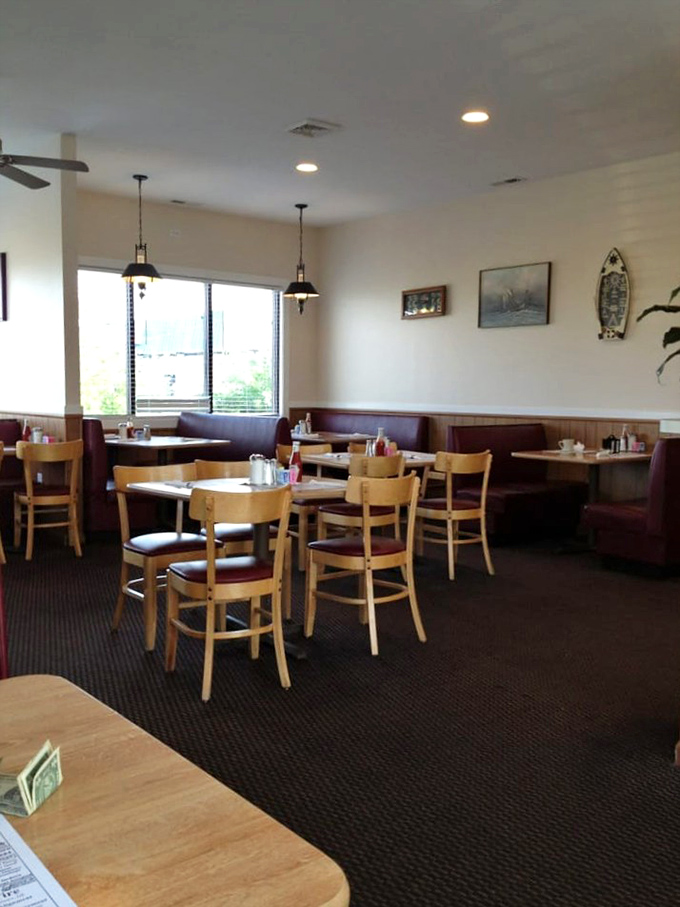 Simple wooden tables, comfortable burgundy booths, and unpretentious decor create that magical atmosphere where calories don't count and everyone feels like a regular.