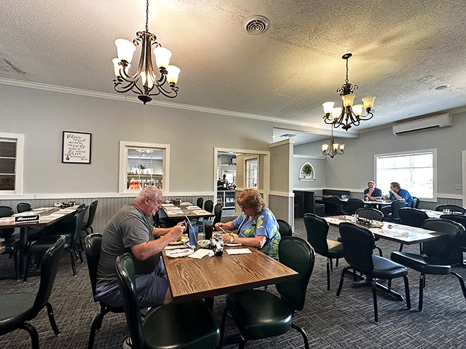 Simple elegance meets homestyle comfort in Dienner's dining room, where those chandeliers have witnessed countless "mmm" moments and happy food comas.