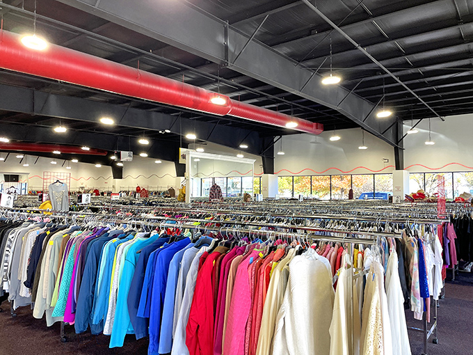 A rainbow of possibilities hangs in perfect order&mdash;this isn't your grandmother's cluttered thrift shop, but a carefully curated clothing wonderland.