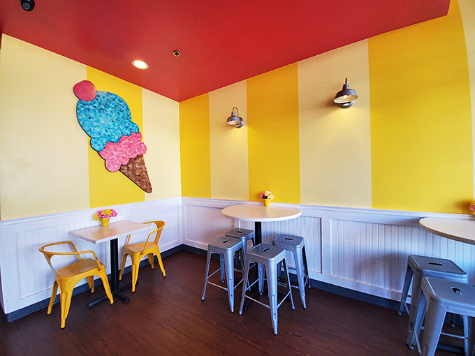 Cheerful yellow stripes, a bold red ceiling, and that adorable ice cream cone mural create the perfect backdrop for your inevitable "yes, I'm living my best life" selfie.