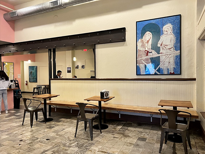 Inside, pink walls and local art create an atmosphere that's both modern and nostalgic, like walking into your coolest friend's apartment that happens to serve ice cream.