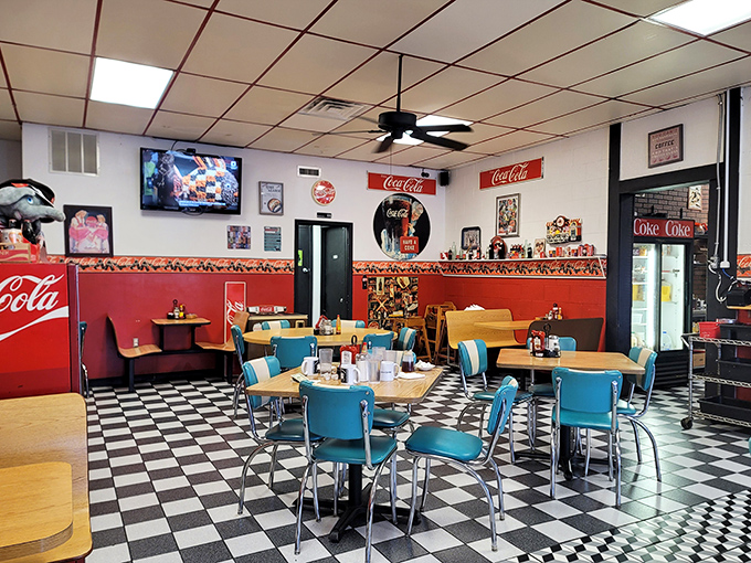 Step into a time machine disguised as a diner. The checkered floor and turquoise chairs aren't trying to be retro—they've simply always been awesome.