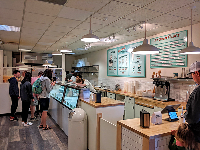 "EAT ICE CREAM" isn't just a suggestion, it's practically a command at Zingers, where the retro-styled mural sets the perfect tone for indulgence.