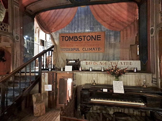 The stage where legends performed now stands frozen in time. That "Wonderful Climate" sign might be the understatement of the 19th century.