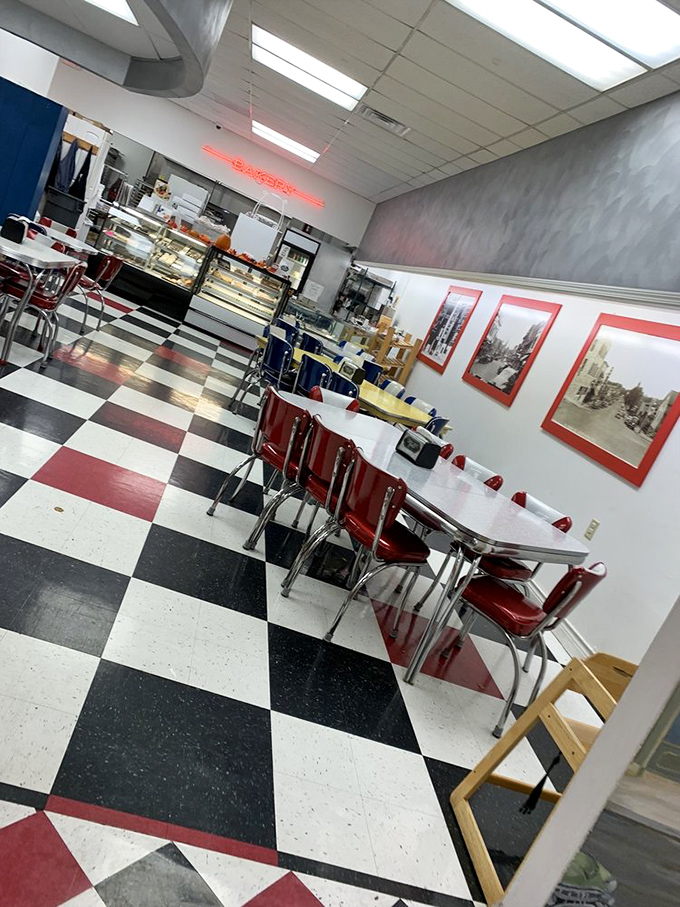 Red vinyl chairs and checkerboard floors&mdash;this isn't just decor, it's a declaration that serious ice cream business happens here