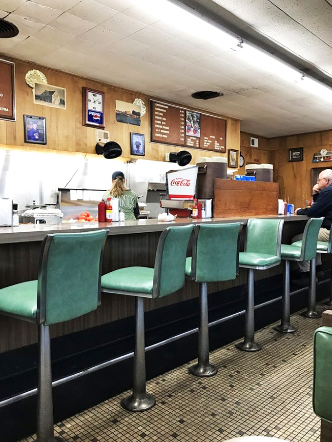 Time-capsule interiors complete with mint-green counter stools invite you to pull up a seat where generations of North Carolinians have experienced burger bliss.