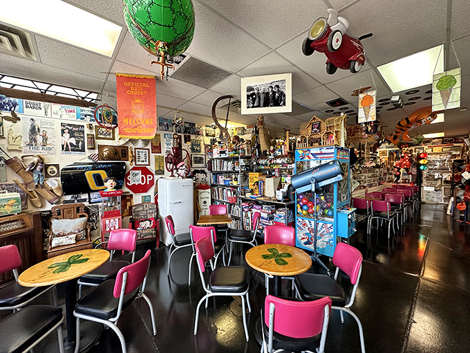 Nostalgia explosion! Every inch tells a story in this whimsical interior where toys, memorabilia, and a red wagon suspended from the ceiling create ice cream's perfect backdrop.