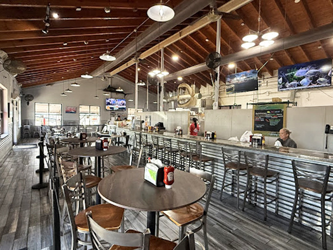 Exposed wooden beams and industrial chic meet nautical charm. The kind of place where paper napkins outnumber cloth ones, and that's exactly right.