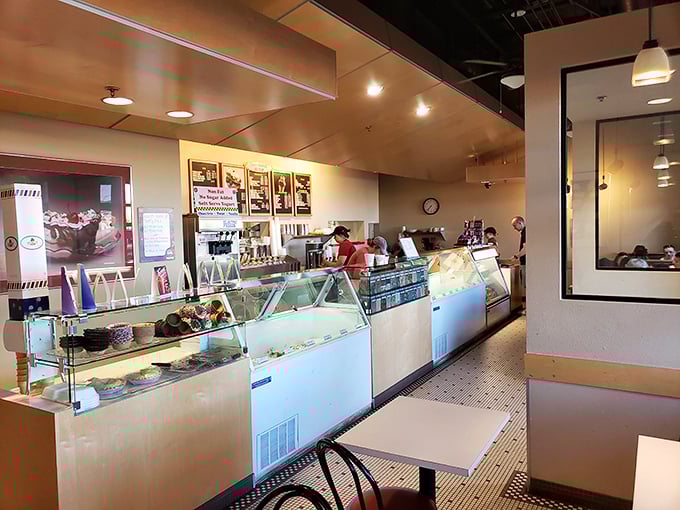 Inside, time slows down as you're greeted by gleaming display cases and that unmistakable sweet aroma that instantly transports you back to childhood summers.