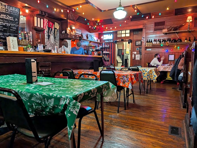 Christmas lights twinkle year-round over mismatched tables with colorful cloths. Dining here feels like a quirky family gathering where everyone actually gets along.