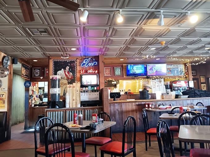 Inside, Elvis watches over diners while the ceiling tiles have absorbed decades of smoky goodness. This is barbecue's natural habitat.