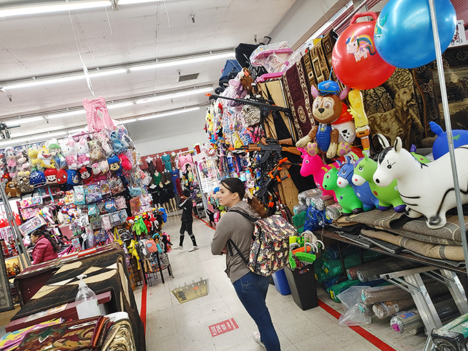 Childhood nostalgia explodes in every direction. This toy vendor's paradise would make even the most serious adult giggle with delight. 