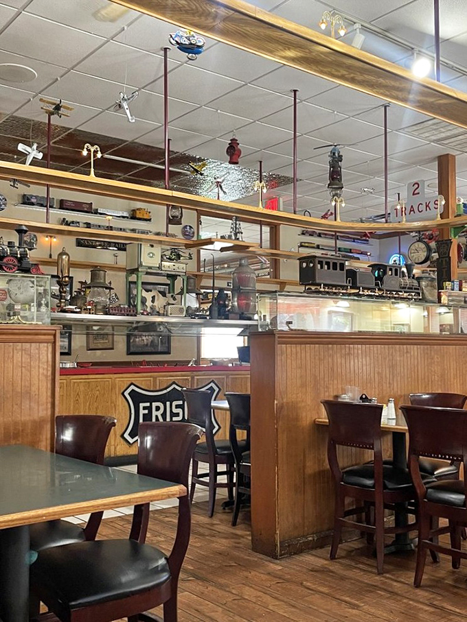 Model trains chug along elevated tracks while diners below enjoy comfort food classics. The Frisco Railway memorabilia creates an immersive experience that's part museum, part restaurant.