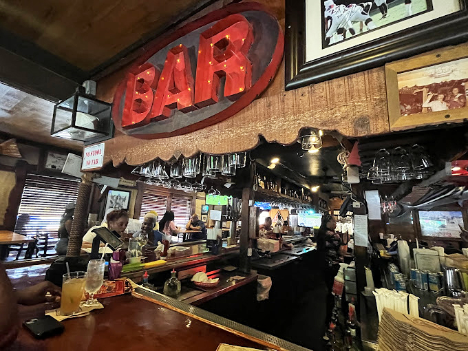 Where neon meets nautical nostalgia - Spondivits' bar area feels like the perfect hideaway for seafood lovers and storytellers alike.