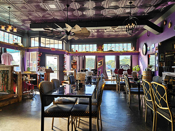 Step inside and the purple walls, ornate tin ceiling, and mismatched furniture transport you straight down the rabbit hole. Time seems wonderfully irrelevant here.