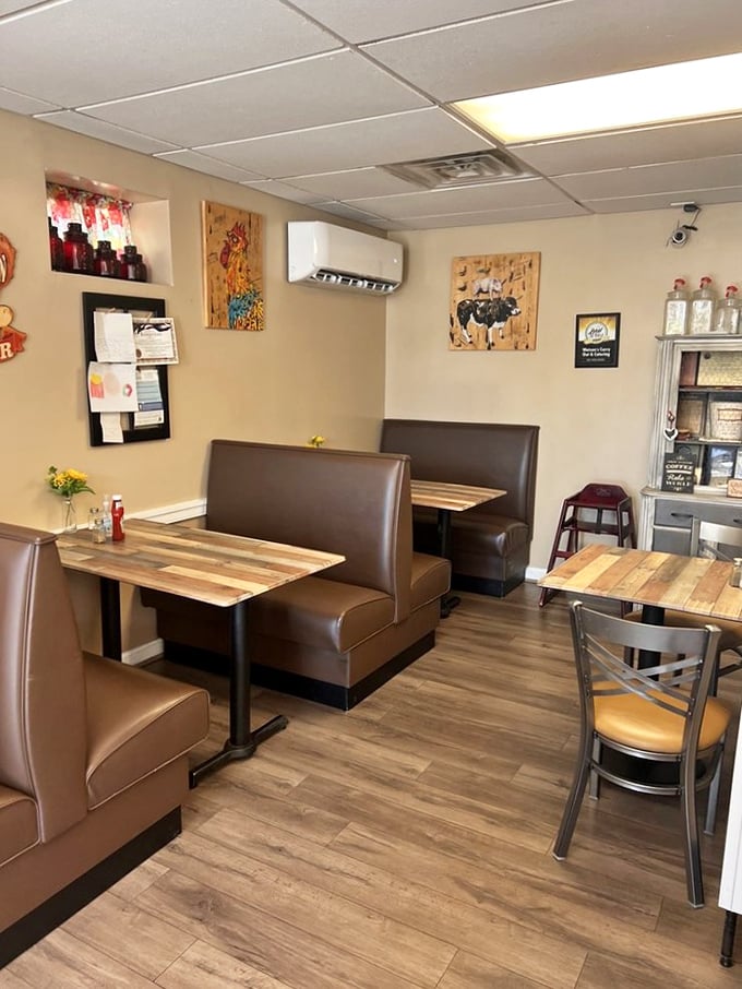 Cozy brown leather booths and simple wooden tables create the perfect backdrop for food that speaks volumes. No distractions, just delicious anticipation.