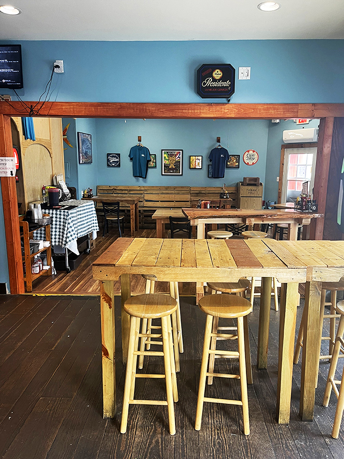Rustic wooden tables and blue walls create the perfect beach-casual vibe. No white tablecloths here&mdash;just honest food and good times.