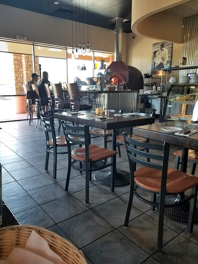 The star of the show: that magnificent copper-domed wood-fired oven, importing a slice of Italy to Arizona's desert landscape with every perfectly charred pizza.