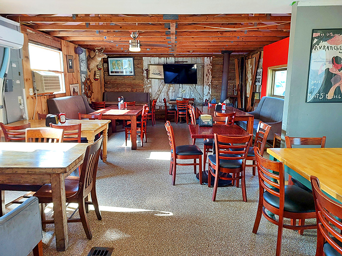 No white tablecloths here, just honest wooden tables where barbecue dreams come true. The rustic interior feels like your favorite uncle's cabin&mdash;if your uncle was a smoke whisperer.