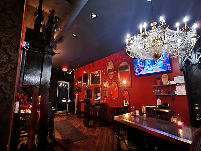 Chandeliers draped in cobwebs and crimson walls create the perfect backdrop for sipping potions that would make Dracula himself jealous. 