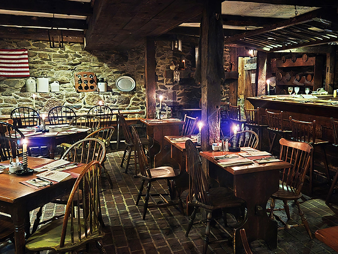 Step inside and you're transported to revolutionary times—stone walls, wooden beams, and candlelight creating the perfect atmosphere for plotting dinner plans.