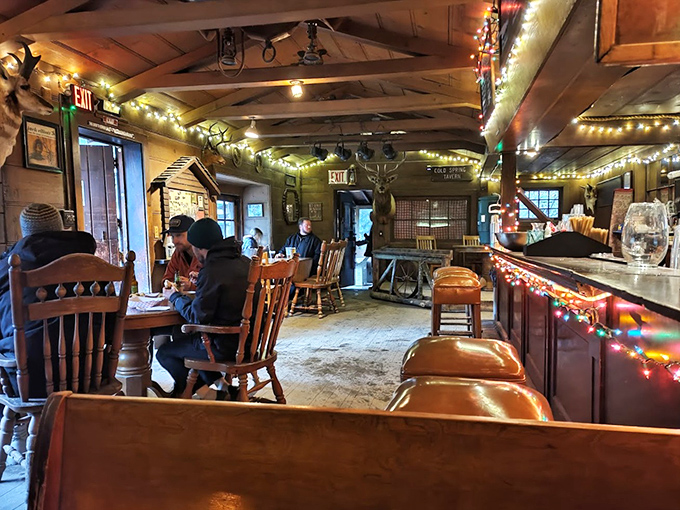 Inside, the tavern feels like a warm hug from the past&mdash;wooden beams, twinkling lights, and chairs that have heard a thousand stories.