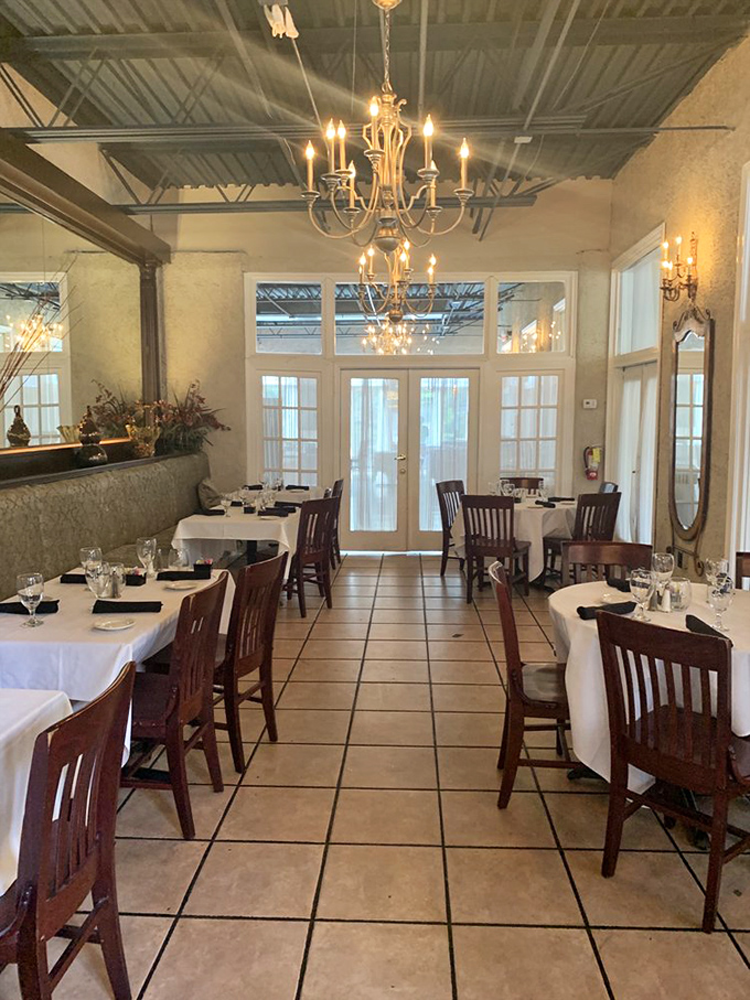 Elegant chandeliers cast a warm glow over crisp white tablecloths. This isn't just dining&mdash;it's dinner and a show where the food plays the starring role.