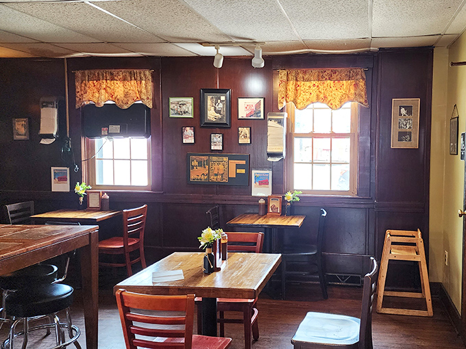 Simple wooden tables, floral curtains, and walls adorned with memorabilia&mdash;this isn't interior design, it's barbecue authenticity in its natural habitat.