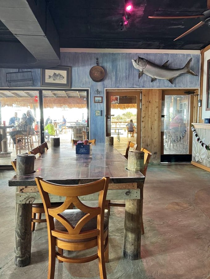 Rustic wooden tables, mounted fish, and water views through every window&mdash;this isn't Florida-themed decor, it's just Florida.