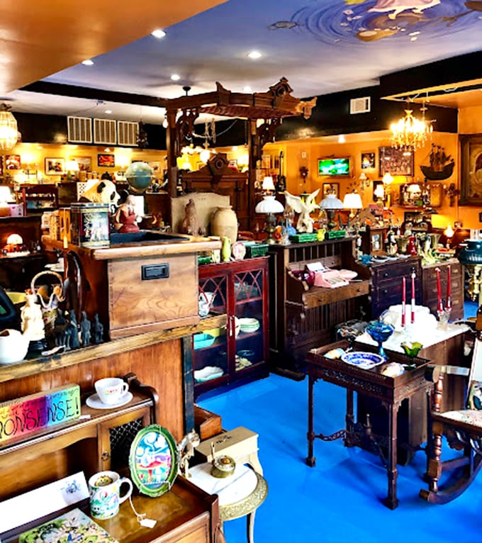 Not your grandmother's curio cabinet! This treasure-packed interior makes me feel like I've wandered into a Victorian collector's fever dream.