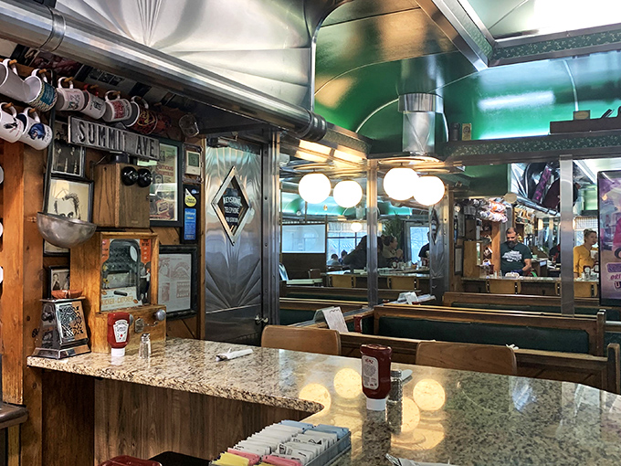 Inside, time stands still in the best possible way. Coffee mugs stand at attention while the polished countertops reflect decades of breakfast conversations.