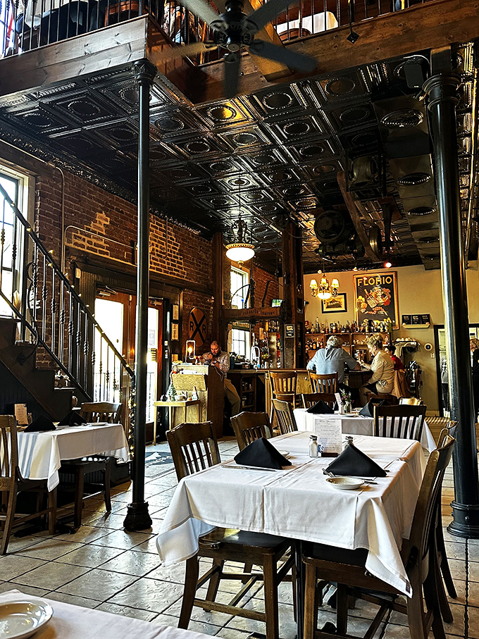 Step inside to discover soaring ceilings, exposed brick, and that magical ambiance only decades of hospitality can create. Like a time machine with better food and no weird side effects.