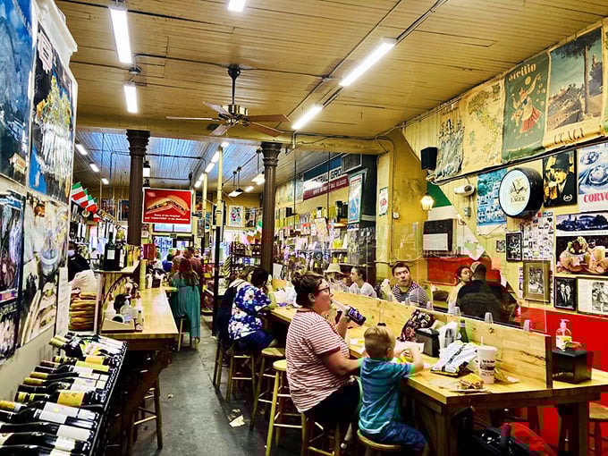 Inside, time stands still as locals and tourists share communal tables, surrounded by decades of Italian imports and the happy sounds of satisfied eating.