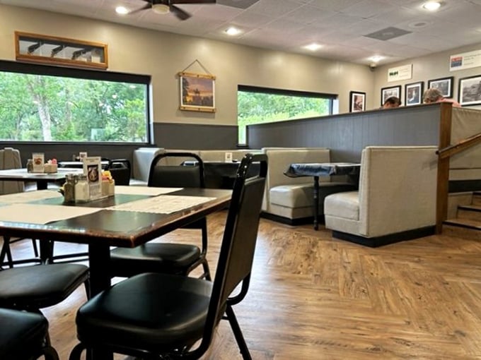 Comfortable booths, warm wood tones, and large windows create that perfect "everybody knows your name" atmosphere where memorable meals and conversations naturally unfold.