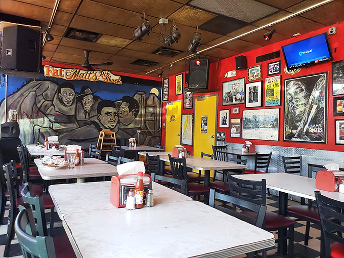 Blues legends watch over diners from vibrant murals as the red and yellow walls set the stage for Atlanta's most soulful dining soundtrack.