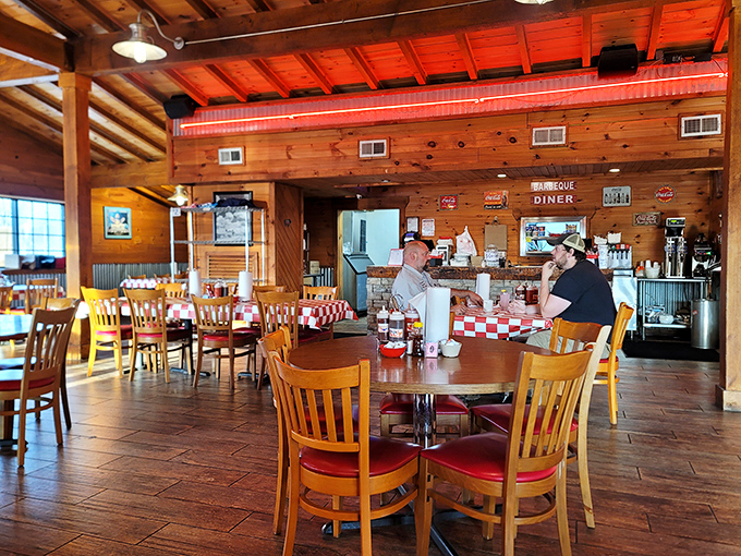 Warm wood paneling, checkered counters, and that unmistakable aroma of slow-cooked meats&mdash;stepping inside feels like coming home, if home smelled this delicious.