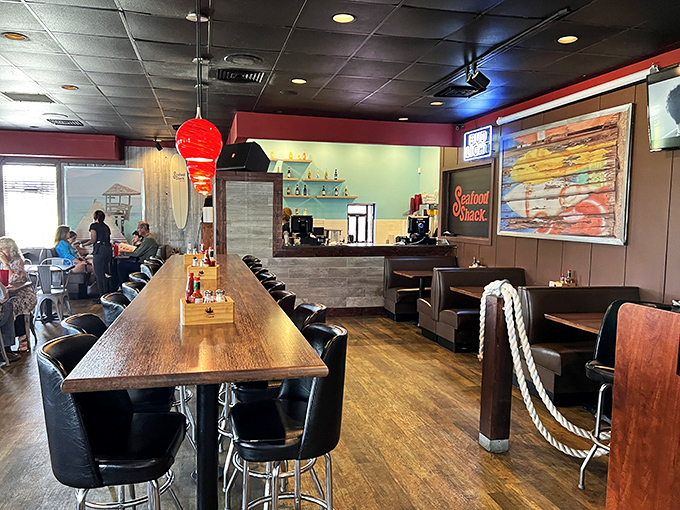 Inside, nautical charm meets cozy dining. That long community table isn't just furniture&mdash;it's where strangers become friends over shared crab leg cracking techniques.